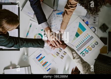 Business team hands collaborating on UI UX design creative process with ...