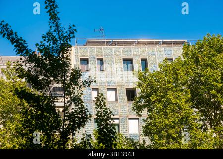 France, Paris, Emmaüs social housing building covered with solar panels ...