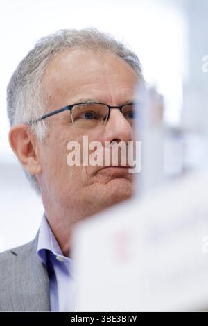 Austrian Finance Minister Markus Marterbauer in his office in Vienna ...