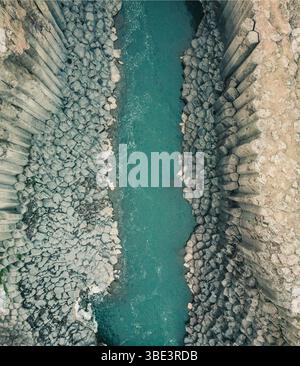 Aerial view of striking basalt columns stand sentinel against a ...
