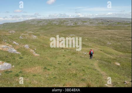 Man descending Foel Fraith towards Garreg Las, Black Mountain, Wales ...