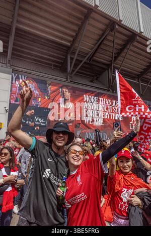 Liverpool fans celebrate outside Anfield, Liverpool Stock Photo - Alamy