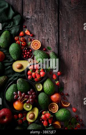 Assortment of fresh summer fruits and vegetable snacks for a picnic ...