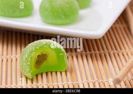 Sweet Melon Flavored Fruit Mochi on a Bamboo Mat Stock Photo - Alamy