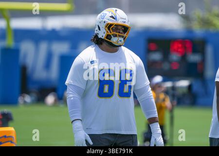 Los Angeles Chargers offensive lineman Trevor Penning (64) walks on the ...