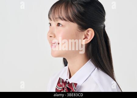 White background, Japanese Junior High School Girl, smiling Stock Photo ...