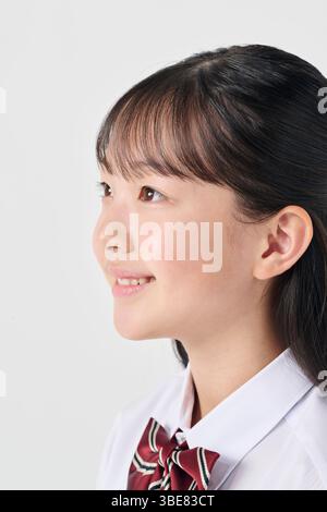 White background, Japanese Junior High School Girl, smiling Stock Photo ...