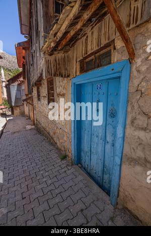 Valley view of Kemaliye town. View of the old Kemaliye houses and the ...