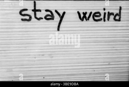Welcome. Stay Weird. Letters on the wall Stock Photo - Alamy