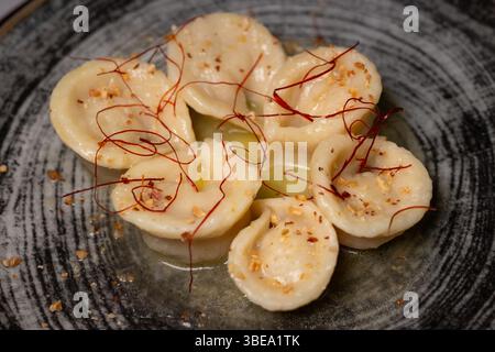 A gourmet plate of Cjarsons, typical stuffed pasta from Carnia in ...