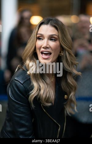 Delta Goodrem performs on the Sir Elton John piano at St Pancras ...