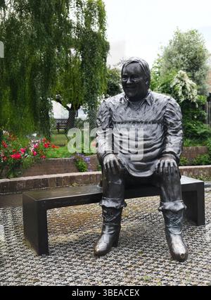 Bronze statue of Dave Lee the famous pantomime dame outside the Marlowe ...