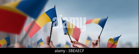Chad flag in hand. Patriotic background. National flag of Chad ...
