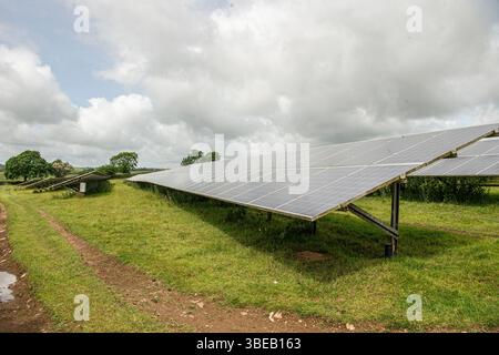 Solar panels in the landscape with a cloudy sky of background Stock ...