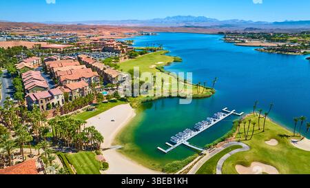 Aerial view of luxury boats and villas on Mediterranean Sea framed by ...