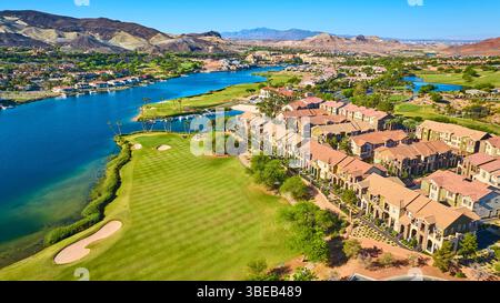 Aerial Luxury Lakeside Golf Community with Modern Homes and Desert ...