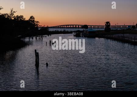Bay St. Louis Bridge passes behind an inlet at Henderson Point in Pass ...