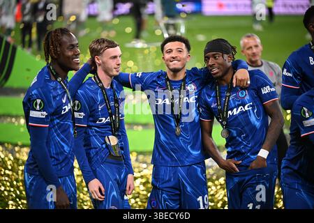 Chelsea's Trevoh Chalobah (left), Noni Madueke and Chelsea's Jadon Sancho take a selfie with the ...