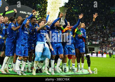 Chelsea's Reece James lifts the trophy besides President Donald Trump ...