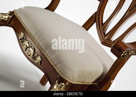 Luxury gold plated kitchen chair in the Baroque style. Three positions ...