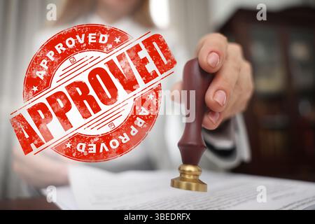 Woman stamping document at table and red stamp Approved, banner design ...