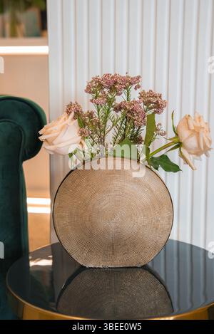 decorative pink roses in the shape of a frame with a red ribbon on top ...