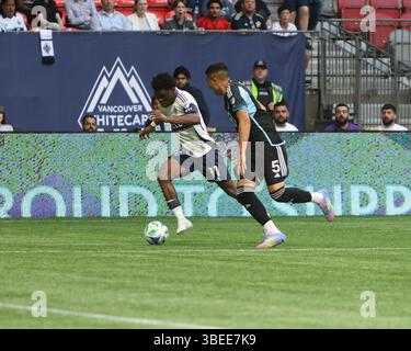 Vancouver Whitecaps forward Emmanuel Sabbi (11) pursues the ball during ...