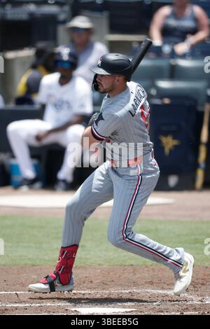 Tampa Bay Rays' Kameron Misner runs to home plate to score on a single ...