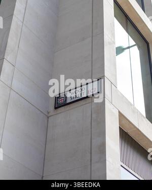 The City of London crest and emblem displayed on a bollard marking the ...