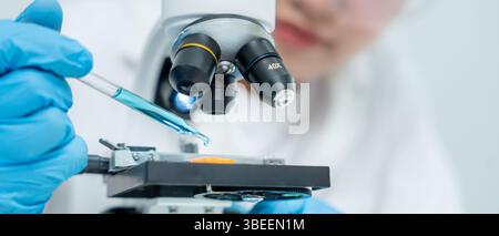 Scientist analyze biochemical samples in advanced scientific laboratory ...