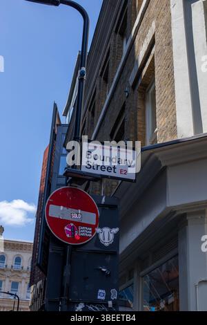 London: stickers on traffic signs Stock Photo - Alamy