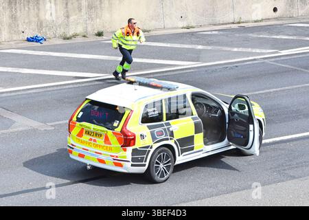 National Highways Traffic Officer at work halts rolling road block M25 ...