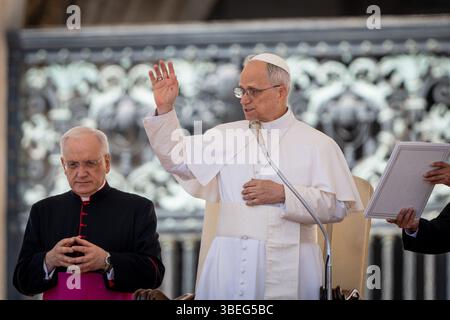 Pope Leo XIV delivers his blessing at the end of an audience with the ...