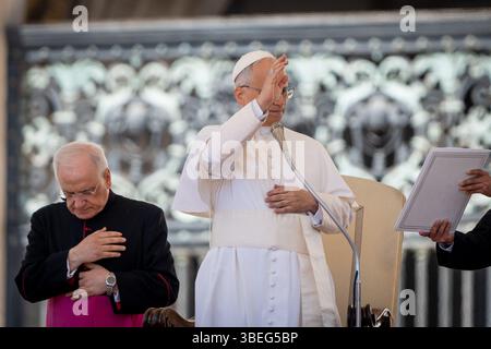Pope Leo XIV delivers his blessing during his Wednesday General ...