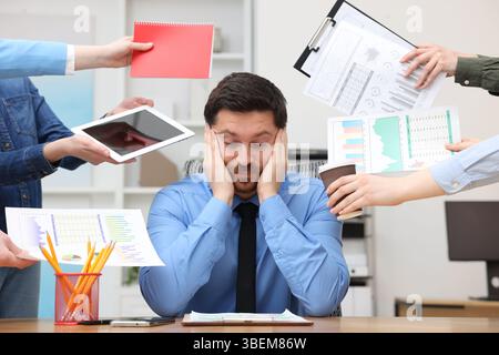 Businessman, tablet and paperwork with stress and anxiety in the ...