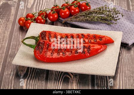 Grilled whole red paprika ramiro pepper Stock Photo - Alamy