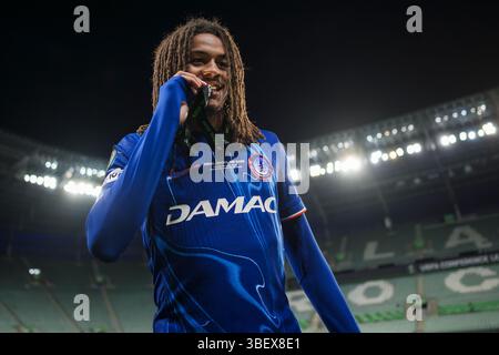 Mathis Amougou celebrates during the award ceremony following the UEFA ...