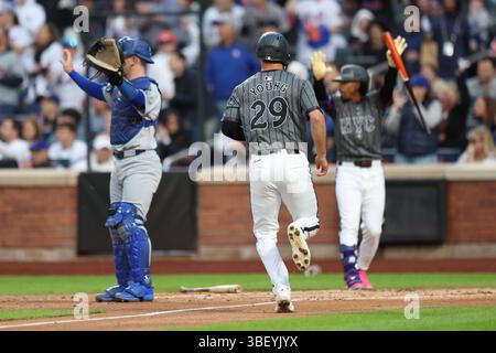 New York Mets' Jared Young watches his RBI sacrifice fly during the ...