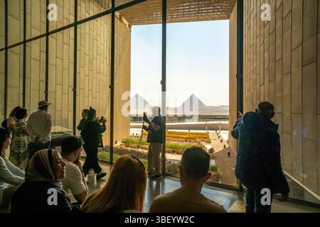 View of Giza Pyramids from the interior of the Grand Egyptian Museum ...