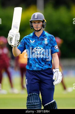 England's Amy Jones leaves the ground after losing her wicket to ...