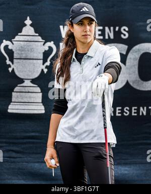Julia Lopez Ramirez, of Spain, looks over a putt on the 15th hole ...