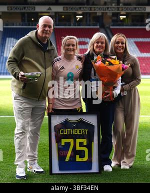 Scotland's Erin Cuthbert presented with a shirt to mark her 75th cap ...
