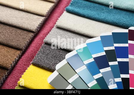 Samples of colorful fabrics and color palettes, top view Stock Photo ...