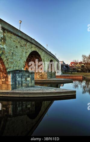 The Roman Stone Bridge spanning the Danube River in Regensburg, Germany ...