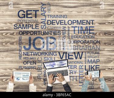 Group of three people with devices in hands working together as symbol ...