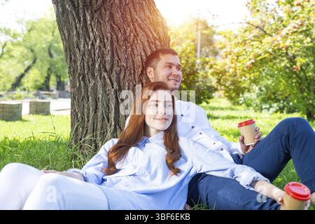 Handsome man and his girlfriend spend time in bed Stock Photo - Alamy