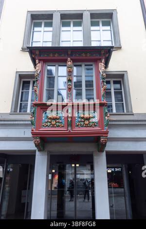 A close-up view of an ornate storefront showcasing the Cartier brand ...