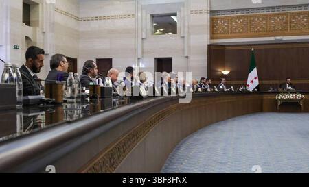 Syrian President Ahmad Al-Sharaa attends the launch ceremony of the new ...