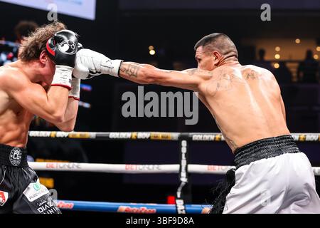 May 30, 2025: (R-L) Super Welterweight Cayden Griffiths punches Edgar ...