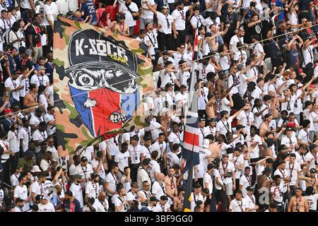 PSG fans cheer their team before the Champions League final soccer ...